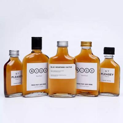Cina Bottiglia d'acqua di vetro da 200 ml con logo stampato Collare Materiale Tappo di vetro Tappo spray in vendita