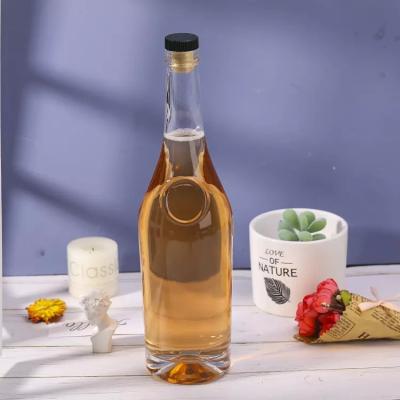 Cina Bottiglia in vetro di 700 ml con coperchio di sughero con base spessa in vendita