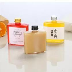 Cina 50 ml 100 ml 200 ml 250 ml 500 ml Bottiglia di vino piatta in vetro chiaro per succo di caffè da bere a freddo in vendita