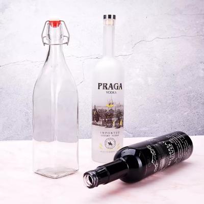 中国 ウォッカ用のカスタムデザインのガラスボトル 375ml 500ml 700ml 750ml ベース素材 販売のため