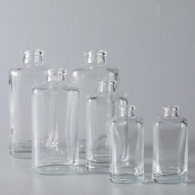 Cina Vetro rotondo Vino liquoroso Whisky Tequila Vodka Bottiglia con sughero 100ml 200ml 250ml 300ml in vendita