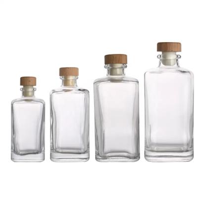 Cina Vetro rotondo Vino liquoroso Whisky Tequila Vodka Bottiglia con sughero 100ml 200ml 250ml 300ml in vendita