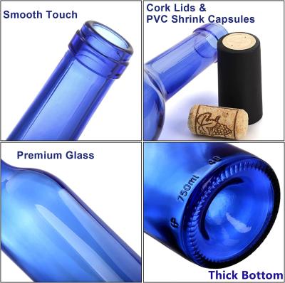 Cina Bottiglie di vetro da 750 ml per vodka champagne succhi di frutta bevande decorazioni azzurro cobalto rotondo in vendita
