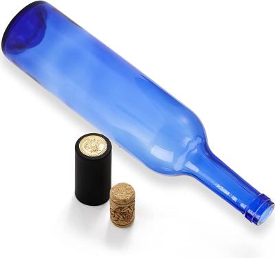 Cina Bottiglie di vetro da 750 ml per vodka champagne succhi di frutta bevande decorazioni azzurro cobalto rotondo in vendita