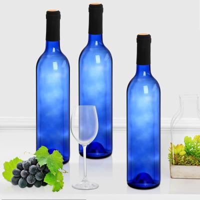 Cina Bottiglie di vetro da 750 ml per vodka champagne succhi di frutta bevande decorazioni azzurro cobalto rotondo in vendita
