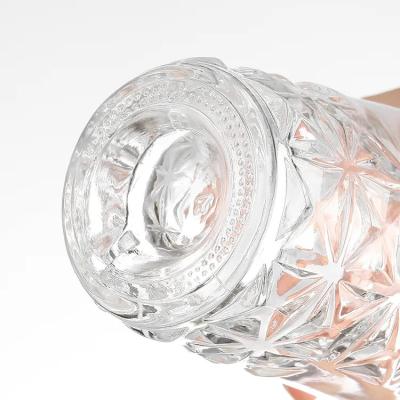 Cina 500 ml 750 ml 1000 ml Bottiglia di vetro a tenuta di tipo di sughero con macchina da riempimento da 100 ml in vendita