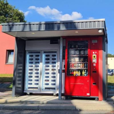 Cina Macchina di vendita di torte in metallo nero veloce e conveniente in vendita