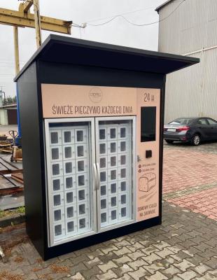 中国 角度のあるタッチスクリーンを備えた屋外ベーカリー自動販売機ディスプレイクリアな視認性簡単な操作 販売のため