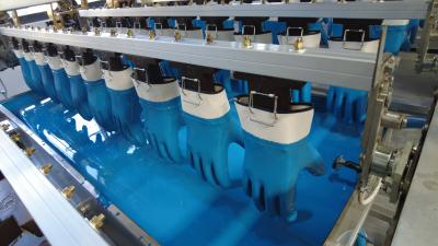 China Fully Automated Glove Dipping Line with 4000 Gloves Per Hour Capacity and 100mm & 75mm Rock Wool Insulation for sale