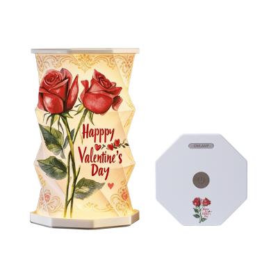 China Portable Glowing Pleated Rotating Paper Lamp LED Foldable Eco Friendly Battery Operated Custom for sale