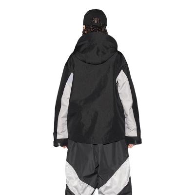 China Skianzug 100% Polyester Erwachsene Winterwinddichte Outdoor-Sportjacke für Männer und Frauen zu verkaufen