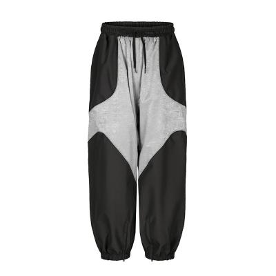 Cina Sport invernali essenziali Pantaloni da sci per uomini con caratteristiche a prova di vento e impermeabilità in vendita