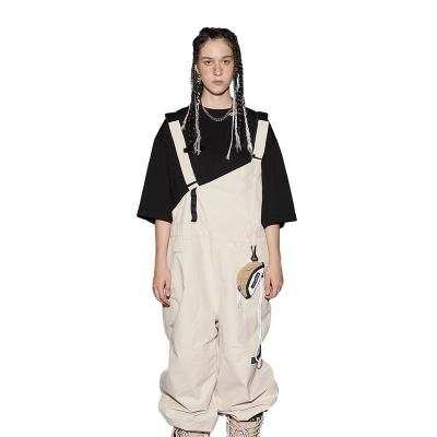 China Unisex ski sneeuwkleding voldruk lijm jas met schuine kraag en solide kleur Te koop