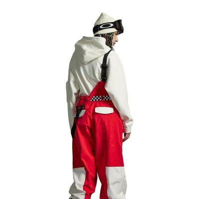 China Naadloze fusie technologie Skipak Warm waterdicht Winddicht jasje met verwarmde broek Te koop