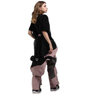 Cina Abbigliamento sportivo Uomini Giacca da sci Abito da sci Snowboard Windproof Waterproof Jumpsuit Sci con cappuccio Abito da neve caldo in vendita