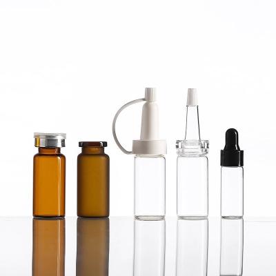 China Bottle factory in China 1ounce glass clear vial with screw caps/childproof caps with colorful bulbs for sale