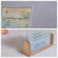 China Crystal Clear Customizable Vertical Photo Frame With Solid Wood Base for sale