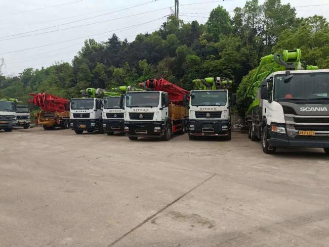 SANY concrete pump truck in operational position with extended boom