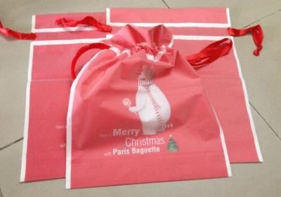 China Biodegradable Christmas deco drawstring candy storage bag, oxford red christmas stocking candy bag packing bagplastics for sale