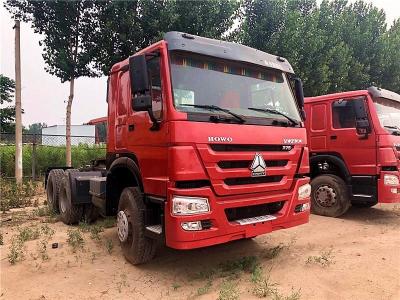 China Excellent Quality Low Price Euro III 12 Wheeler Left Hand Drive 371HP Sinotruck HOWO Used Tractor Truck for Transportation for sale