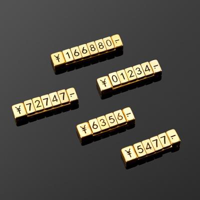 China Gold Magnetic Metal Price Cube Display for Jewelry Counter Signage for sale