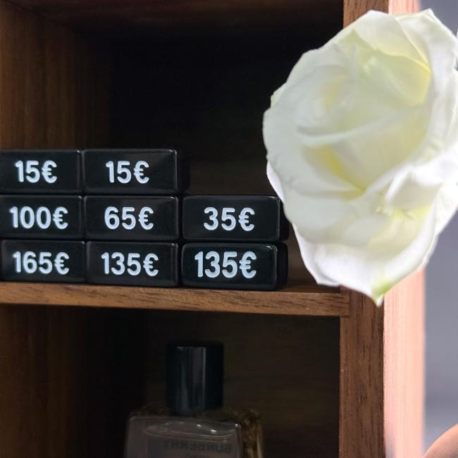 Mahjong-style jewelry price cube display - angled view