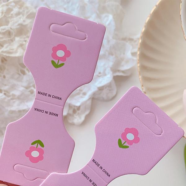 Quality Embossed Folding Hair Tie Cards Pink Purple Floral 100pcs 9 x 3.5 cm for sale