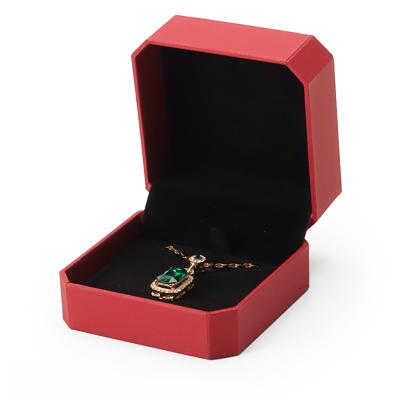 China Red Leatherette Octagon Jewelry Box with Velvet Interior for sale