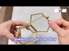 gold hexagonal metal glass jewelry box with hinged lid