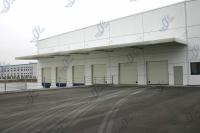 China Vertical Lift Industrial Sectional Door Windproof Multipurpose for sale