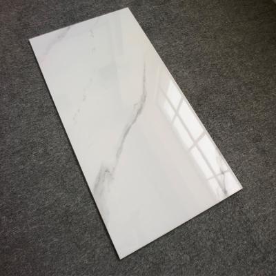 Cina 600x1200 Piastrelle di pavimento in ceramica lucida per la ristrutturazione di cucine e soggiorni moderni in vendita