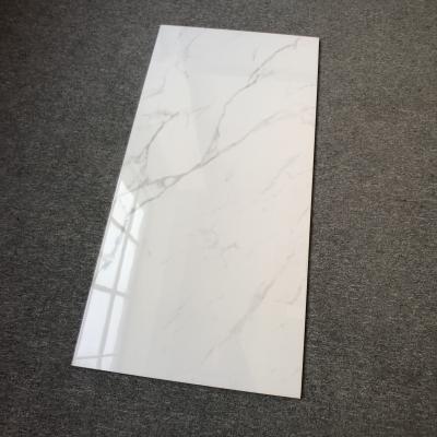 Cina 600x1200 Piastrelle di pavimento in ceramica lucida per la ristrutturazione di cucine e soggiorni moderni in vendita