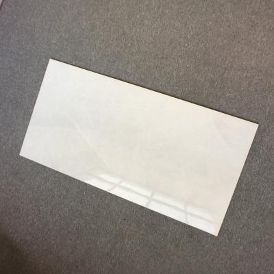 Cina 600x1200 Piastrelle di pavimento in ceramica lucida per la ristrutturazione di cucine e soggiorni moderni in vendita
