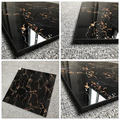 Cina Chic marmo nero e oro pavimento bagno piastrelle in ceramica per pavimento parete giubbotti piastrelle specchio pakistan in vendita