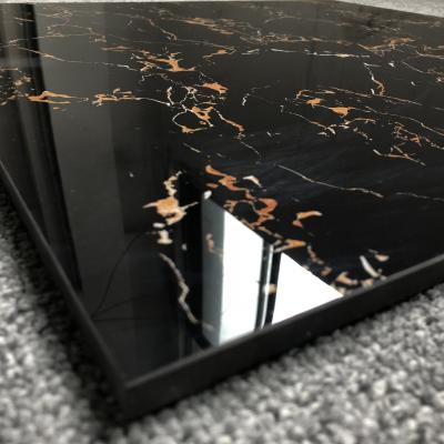Cina Chic marmo nero e oro pavimento bagno piastrelle in ceramica per pavimento parete giubbotti piastrelle specchio pakistan in vendita