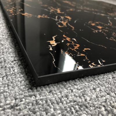 Cina Chic marmo nero e oro pavimento bagno piastrelle in ceramica per pavimento parete giubbotti piastrelle specchio pakistan in vendita