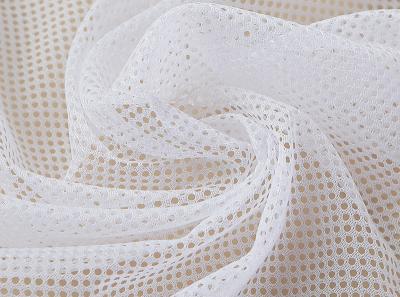 China Customized Knitted Big Mesh Polyester Tulle Hexagonal Fabric for Back Lining 150cm Width for sale