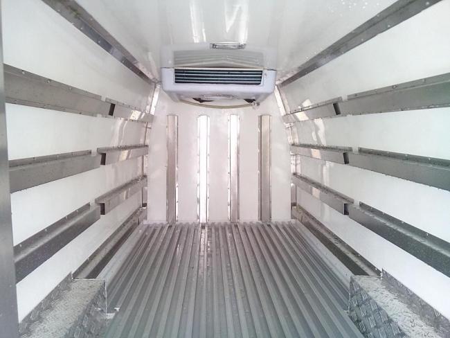 Interior view of refrigeration van showcasing insulation and structure