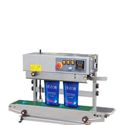 China Automatic Vertical Food Bag Vacuum Automatic Continuous Rice Sealing Machine for sale