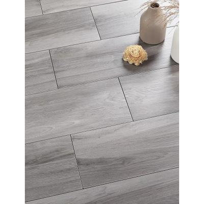 Cina Matt Wood Grain Porcelain Tile lustrato 200x1200mm Brown Grey Indoor Wooden Look Antique in vendita