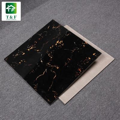 Cina Il nero delle piastrelle per pavimento 600x600 della porcellana e Coloreee lucidati lustrati del fiore dell'oro in vendita
