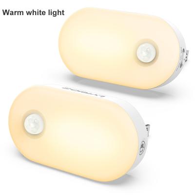 Cina luce notturna del sensore di 0.3W 500mAh Amber Plug In Smart Motion con luminosità regolabile in vendita