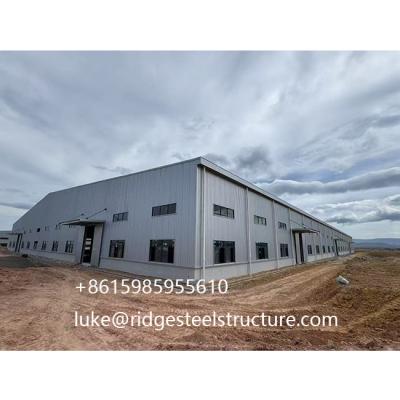 China Prefabricated Steel Structure Mechanical Workshop Metal Frame Steel Storage Building Kits for sale