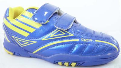 Cina scarpe del calcio dei bambini blu/morsetti calcio del tappeto erboso per la coppa del Mondo in vendita