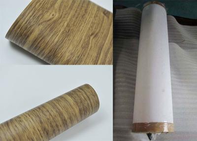 Cina 0.07mm Thick Wood Pattern PVC Decorative Film Flat Surface Roll Packing in vendita