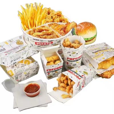 China Impresión personalizada de hamburguesas Kraft Clamshell Caja de hamburguesas Fritas ecológicas Embalaje con aceptación de logotipo en venta