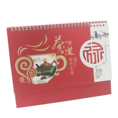China Die Cut Cardboard Desk Calendar Colorful Printed Creative Desk Calendar for sale