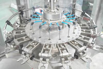 China 4500 Bottles Per Hour Stainless Steel Fill and Seal Roller Sealing Machine With CE ISO9001 for sale