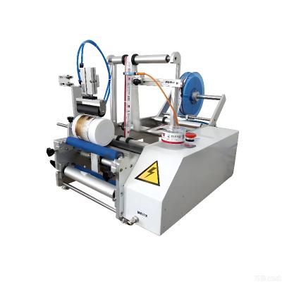 China Semi-automatic Flat-labeling Machine CH-615 for Plastic Boxes and Conical Bottles and Capable of Applying Anti-counterfeiting Labels for sale