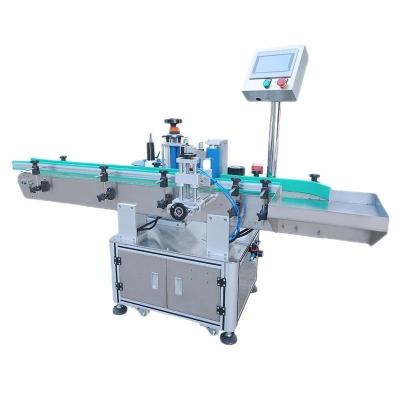 China Fully automatic vertical positioning round bottle labeling machine CH-302 wine bottle glass bottle taper bottle adhesive labeling machine for sale